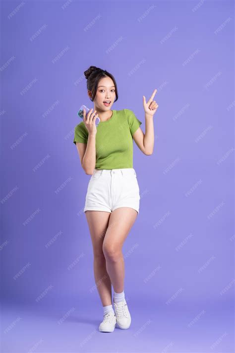 Premium Photo Full Body Image Of Beautiful Asian Girl Posing On Pink