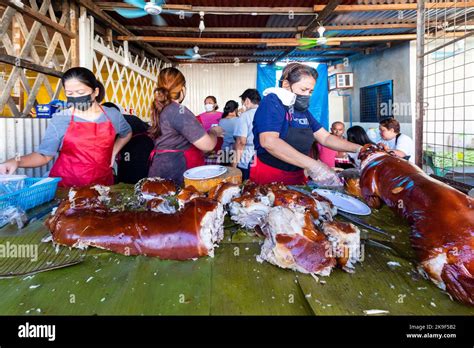 Popular Filipino Lechon Or Roast Pig Sold At A Sunday Market In Cebu