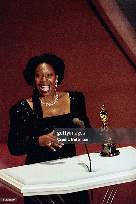Whoopi Goldberg Holds Her Best Supporting Actress Oscar For Her Role
