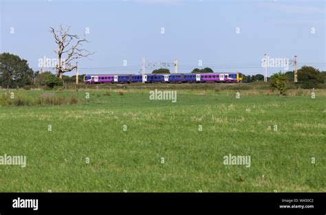 Arriva Northern Rail Class 323 Electric Train Passing Sandbach