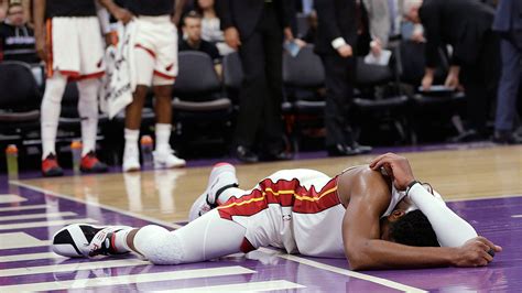 Miamis Dwyane Wade Crashes To Floor Taken To Locker Room