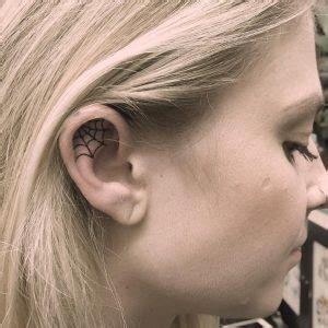Tiny Black Rose Tattoo Behind The Ear Tattoogrid Net