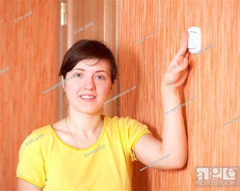 Woman Turning Off The Light Switch Stock Photo Picture And Low Budget Royalty Free Image Pic