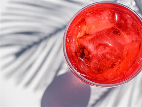 Premium Photo Beautiful Glass With A Pink Cocktail And Ice