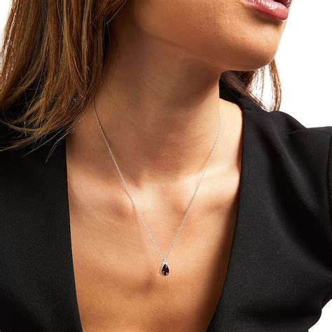 Pear Shaped Garnet And White Lab Created Sapphire Frame Split Bail