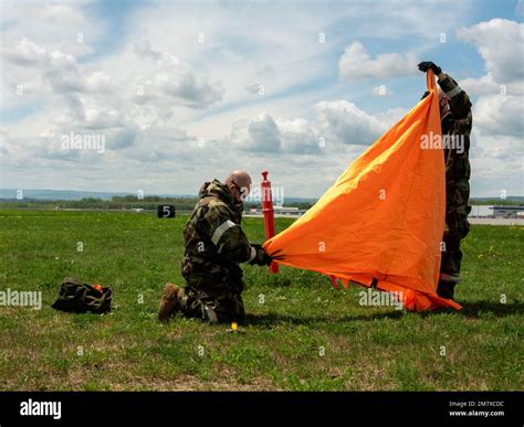 An Airman With The 109th Airlift Wing Prepare A Radial Aerial Marker To
