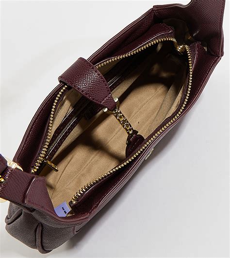 Buy Naturalizer Textured Logo Detail Shoulder Bag In Wine ThStreet UAE