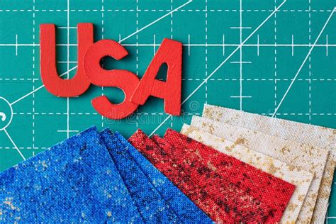 Wooden Letters Consisting To The Abbreviation Usa And Square Pieces Of