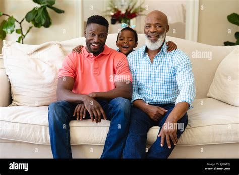 Portrait Of African American Grandfather Father And Granddaughter