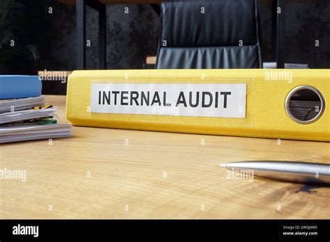 Folder With Label Internal Audit And Notepads Stock Photo Alamy
