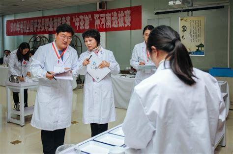 我校生命科学学院张伟执裁首届河南省评茶员职业技能竞赛 信阳师范学院图书馆茶学文献资源平台