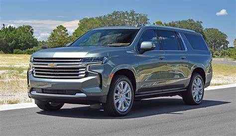 gm recalling nearly 450 000 trucks and suvs over brake warning issue