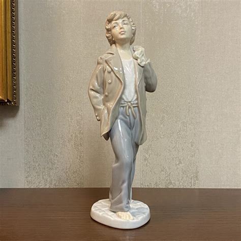 Порцелянова статуетка Nao By Lladro «юнга — ціна 2800 грн у каталозі Статуетки Купити товари