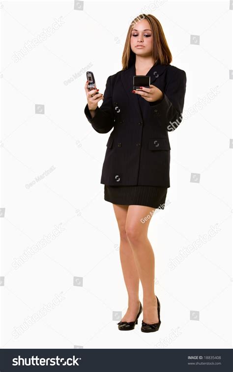 Full Body Of A Young Attractive Brunette Woman Wearing Business Suit