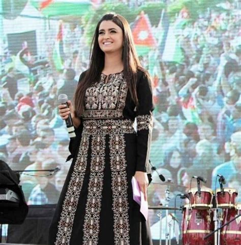 استوحي أجمل الإطلالات المحتشمة من عُلا فارس