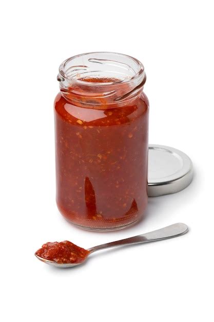 Premium Photo Glass Jar And Metal Spoon With Red Sambal Indonesian