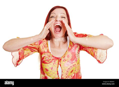 Angry Best Ager Woman Screaming Loudly With Hands At Her Mouth Stock