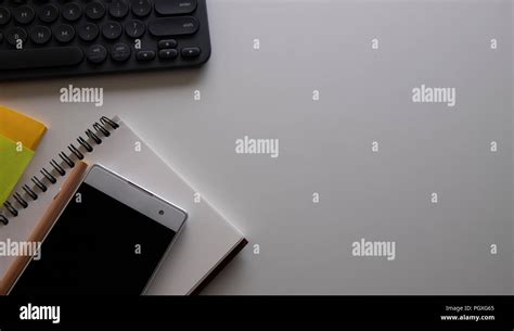 Workplace With Laptop Computer And Office Supply On The White Table In