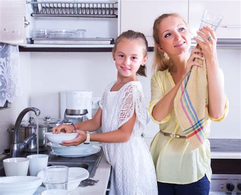 Woman And Girl Washing Dishes Stock Image Image Of Helper Plates