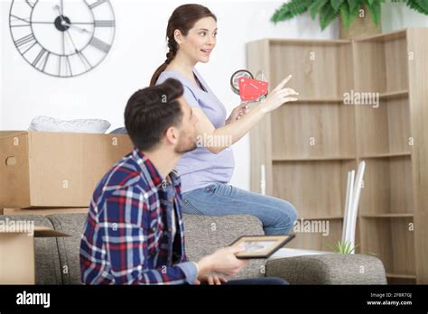 Couple Expecting A Baby In An Empty Room Stock Photo Alamy