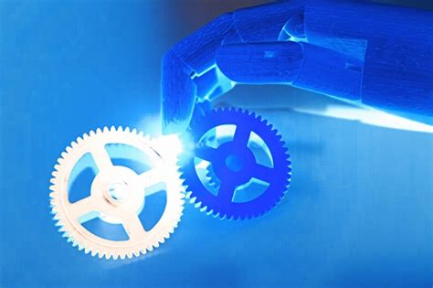 파란색 배경에 기어가 있는 로봇 공학 손입니다 혁신적인 산업 기술 및 인공 지능 개념 3d 일러스트레이션 렌더링 0명에 대한 스톡 사진 및 기타 이미지 Istock