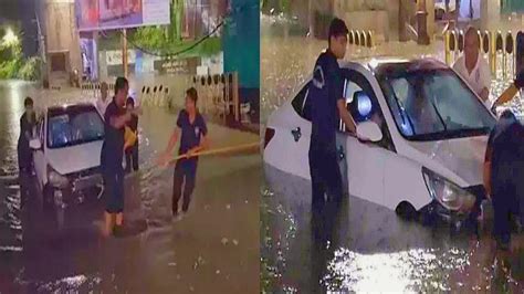 گجرات میں شدید بارش کے دوران انڈر پاس میں پھنسی کار، 4 افراد کو بچا لیا