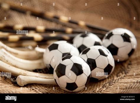 Miniature Soccer Balls In A Weaved Grass Basket With Animal Bones And