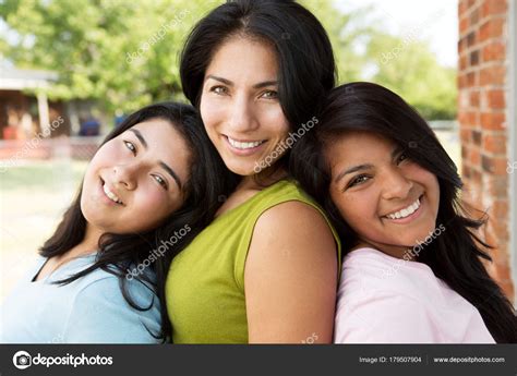 Hispanic Mother And Daughters Stock Photo Pixelheadphoto