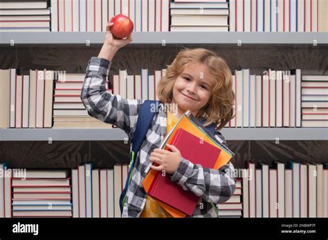School Boy With Books And Apple In Library Nerd School Kid Clever