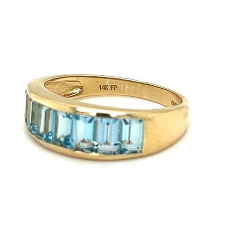 Blue Topaz And 14k Yellow Gold Ring Timekeepersclayton