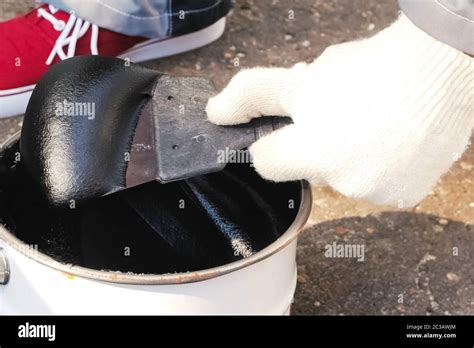 Bituminous Mastic On A Spatula Building Mixtures And Coatings Stock