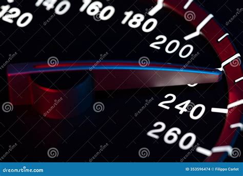 Speedometer Needle Pointing At 230 Kilometers Per Hour On Dashboard