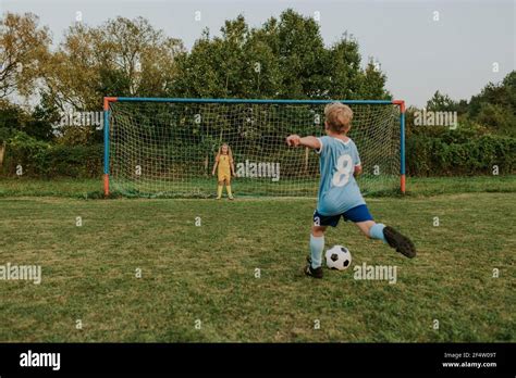 Kicking Soccer Ball In Net