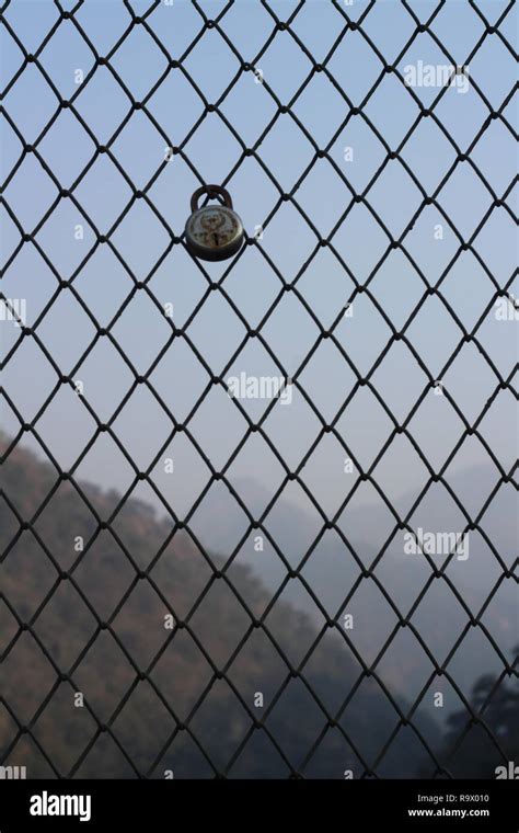Lock On A Metal Wire Mesh Barrier On A Bridge In Pauri Garhwal