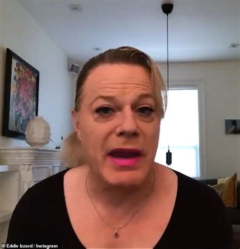 Eddie Izzard Sports Fresh Platinum Blonde Pixie Cut And Pink Mini Dress