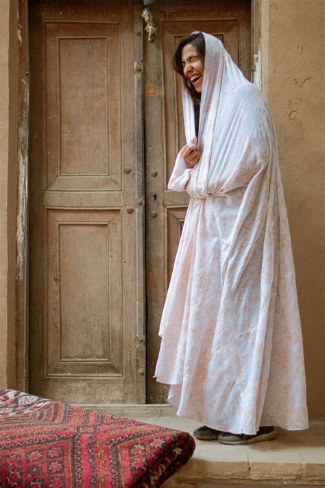 Woman In White Robe Standing Near Brown Wooden Door Photo Free Yazd