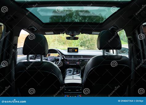 Car Interior View Of Clean Dashboard Massive Windshield And Panoramic