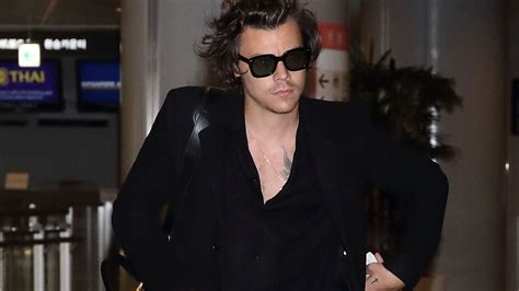 Harry Styles Moves And Dresses Like Jagger At The Airport Vogue