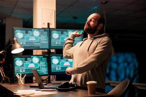 Premium Photo Aggressive Male Hacker Throwing Mouse In Office