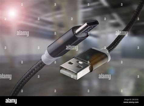 USB Cable And USB Type C On An Industrial Background Stock Photo Alamy