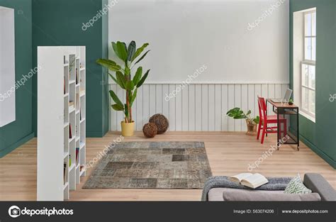 绿色和白色房间背景风格 沙发毛毯细节角落 花束和地毯设计 书架和植物概念花瓶 图库照片UnitedPhotoStudio563074206
