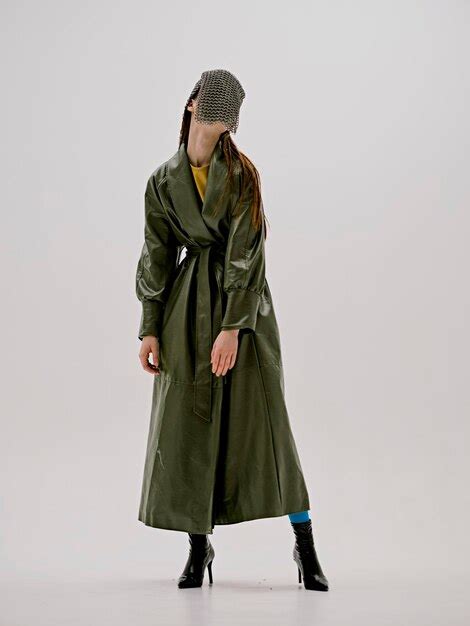 Premium Photo Photo Pretty Woman Posing In A Coat Chain Mail On The