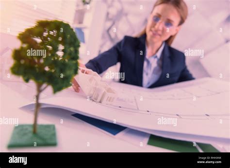 Budding Female Architect Changing Blueprint At Office Stock Photo Alamy