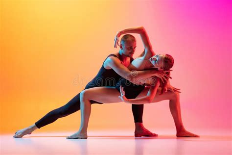 Two Dancers Stylish Sportive Couple Male And Female Models Dancing Contemporary Dance On