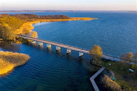 Premium Photo Masurian Lake District In Poland Bridge Over Lake