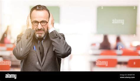 Teacher Man Using Glasses Covering Ears Ignoring Annoying Loud Noise