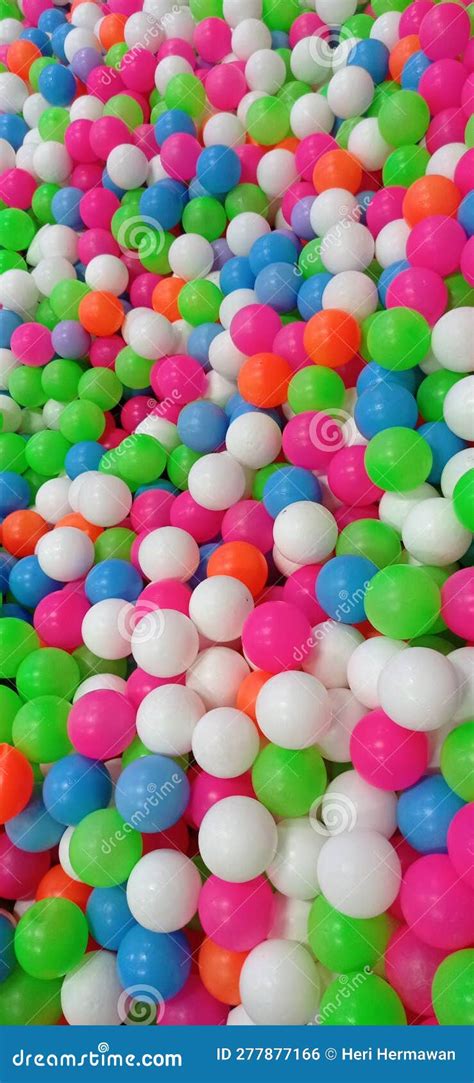 A Collection Of Small Balls With Many Colors In One Container Stock