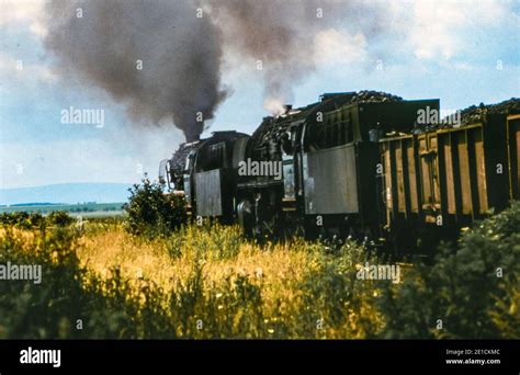 Two Class 50 35 Freight Locomotives With A Heavy Freight Train Near