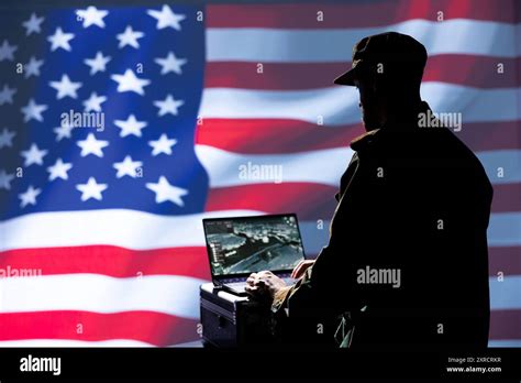 Usa Nato Army Operative Conducts Tactical Reconnaissance Utilizing Laptop For Data Analysis And