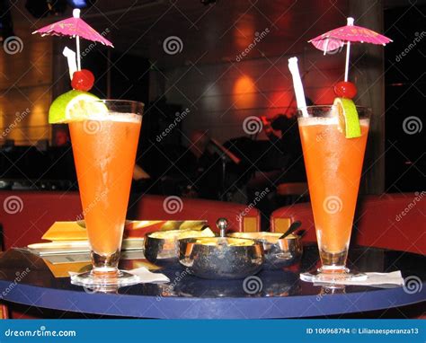 Two Colorful Coctails On The Table Of A Cruise Ship Bar On Vacation